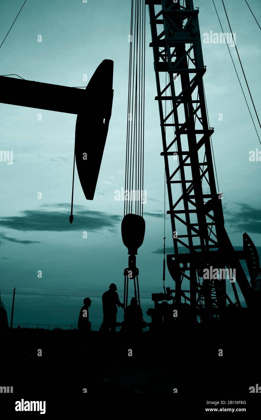 oil field, the oil workers are working Stock Photo - Alamy