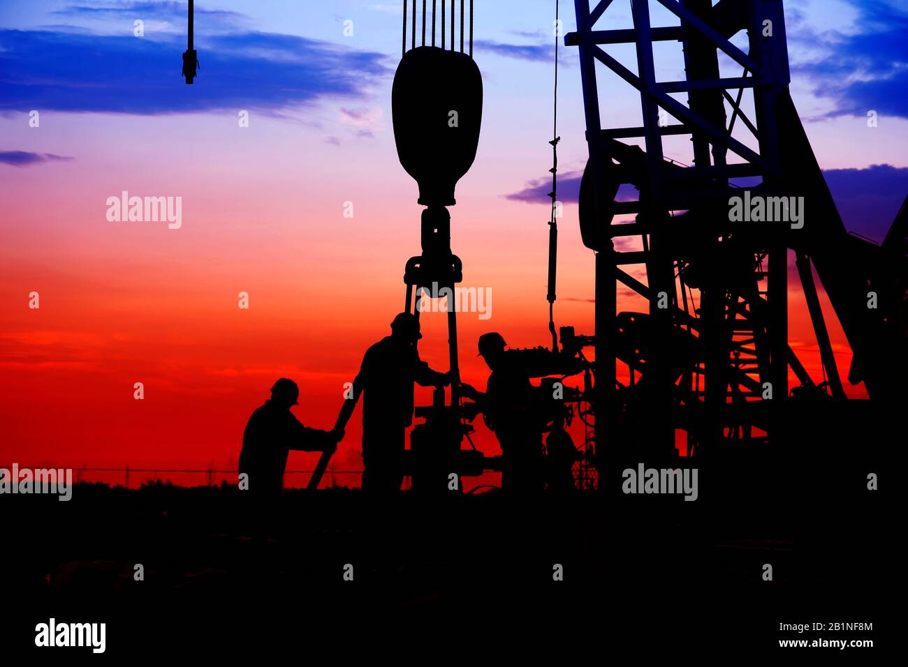 oil field, the oil workers are working Stock Photo - Alamy