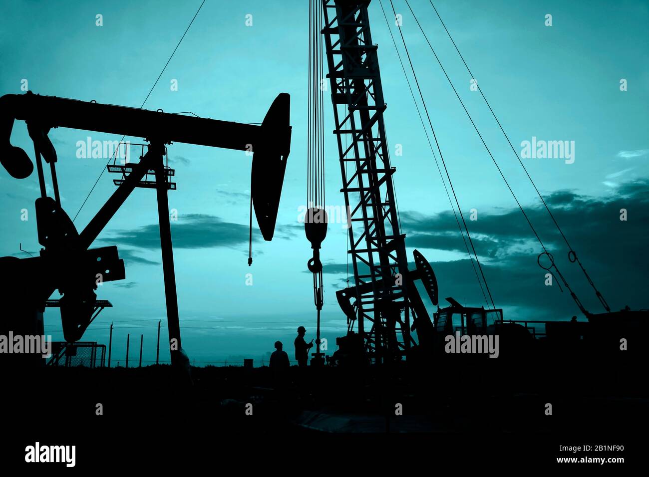 oil field, the oil workers are working Stock Photo - Alamy