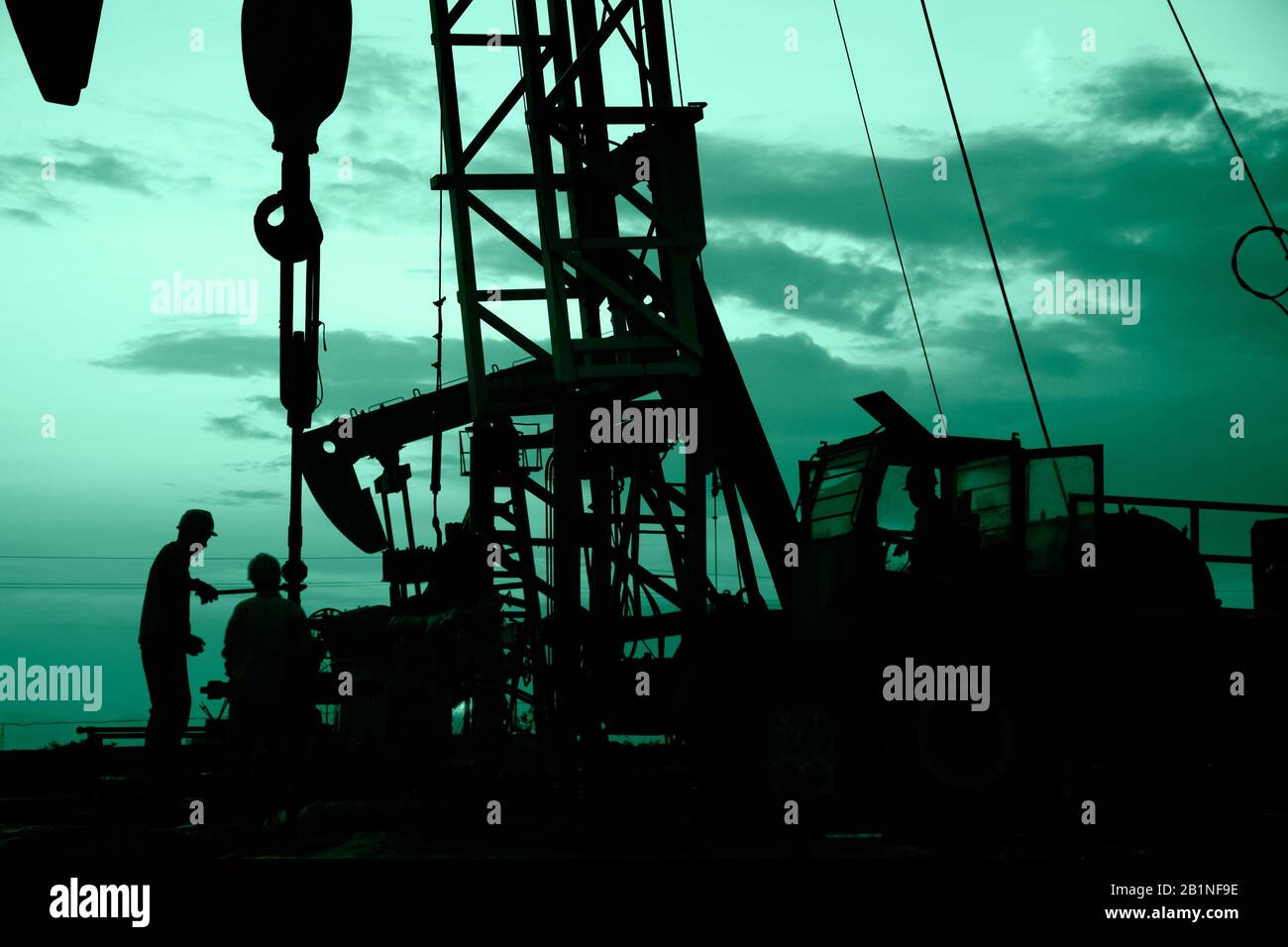 oil field, the oil workers are working Stock Photo - Alamy