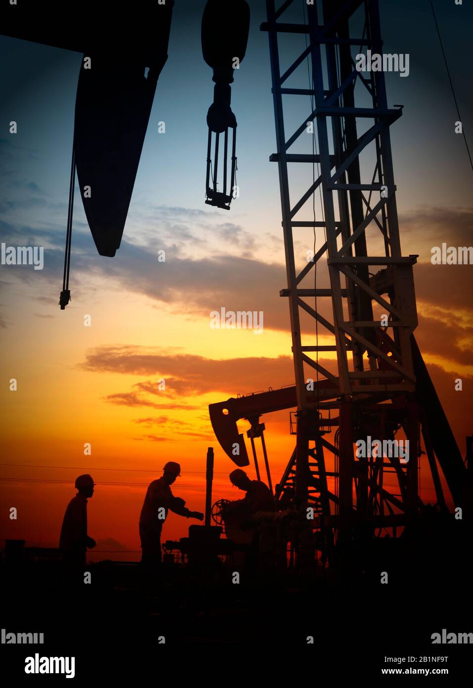 oil field, the oil workers are working Stock Photo - Alamy
