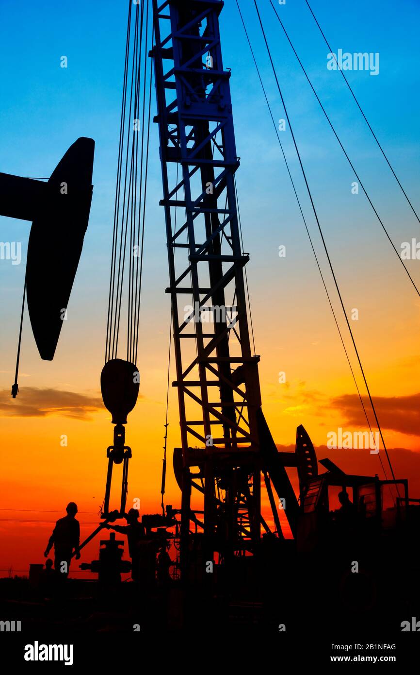 oil field, the oil workers are working Stock Photo - Alamy