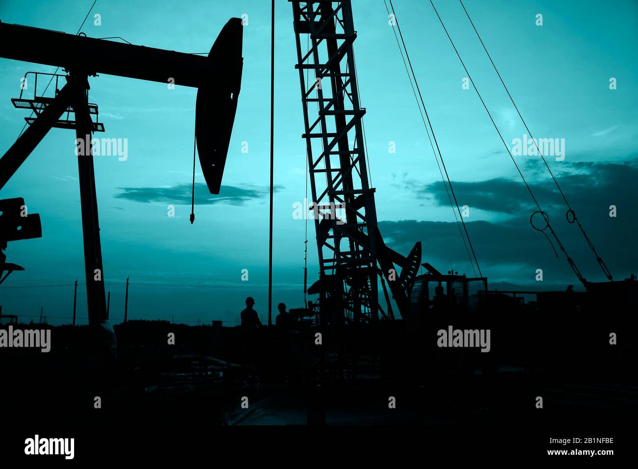 oil field, the oil workers are working Stock Photo - Alamy
