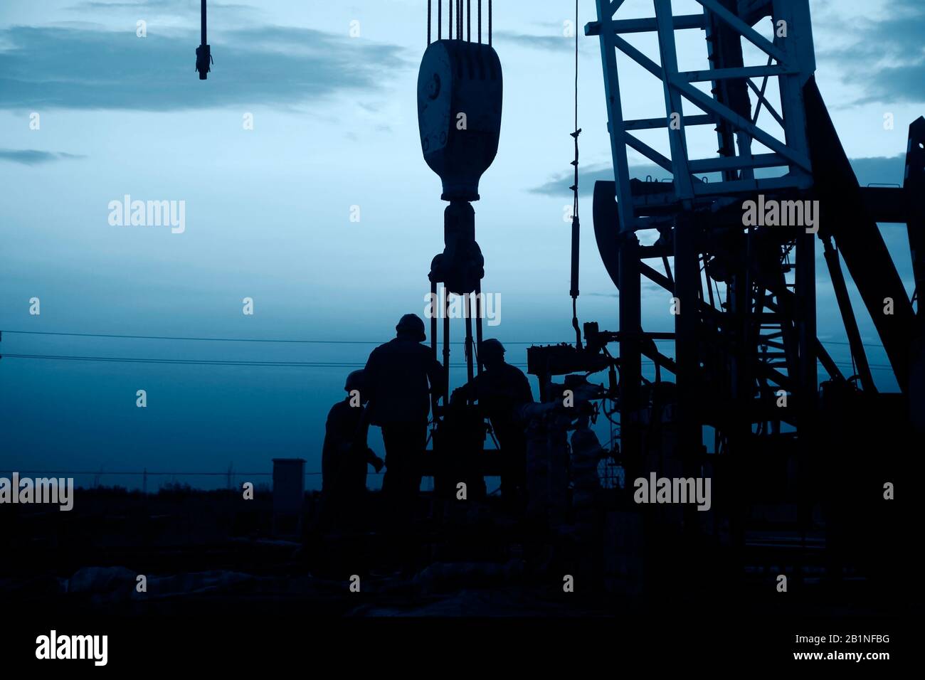oil field, the oil workers are working Stock Photo - Alamy