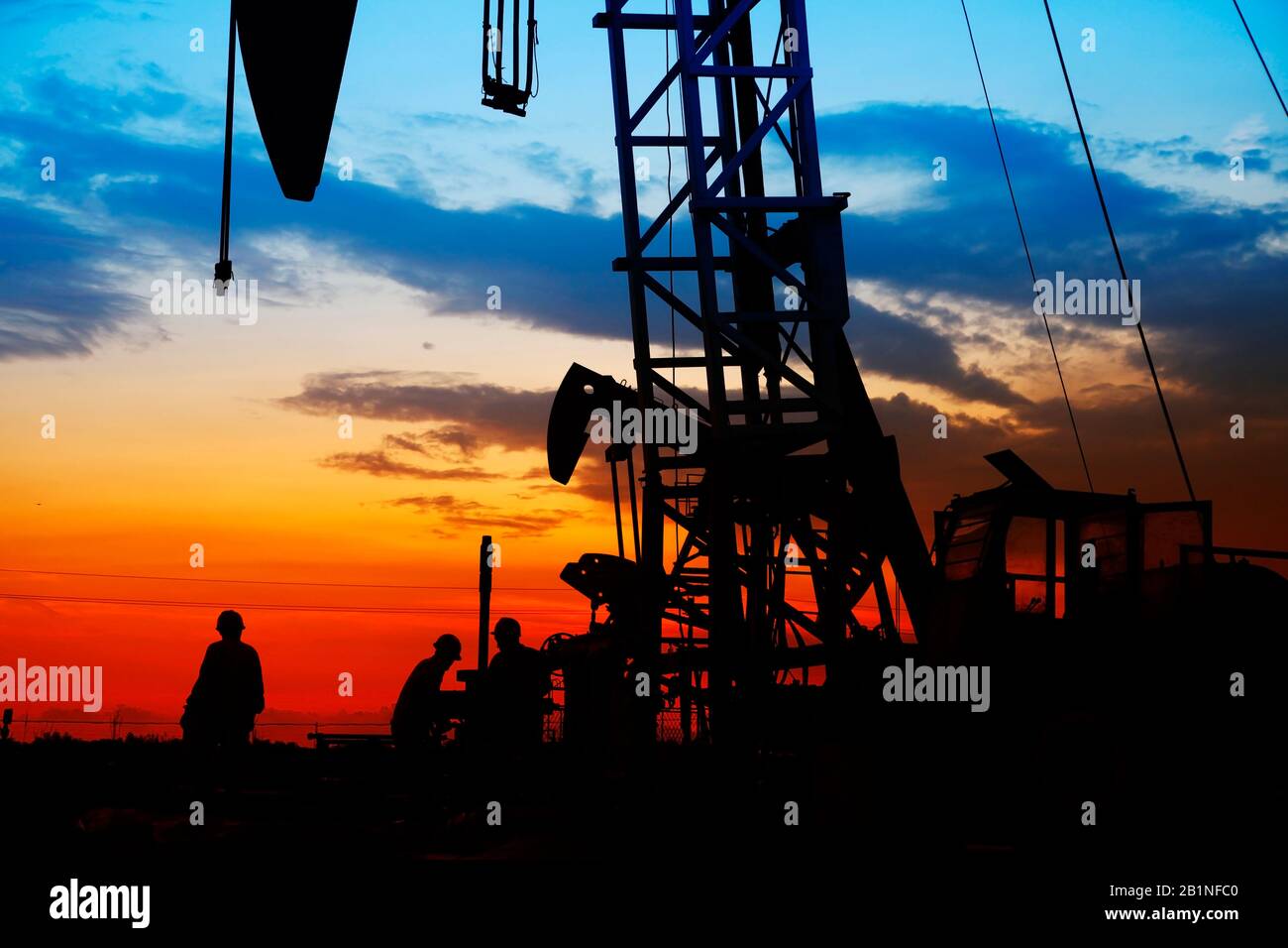 oil field, the oil workers are working Stock Photo - Alamy