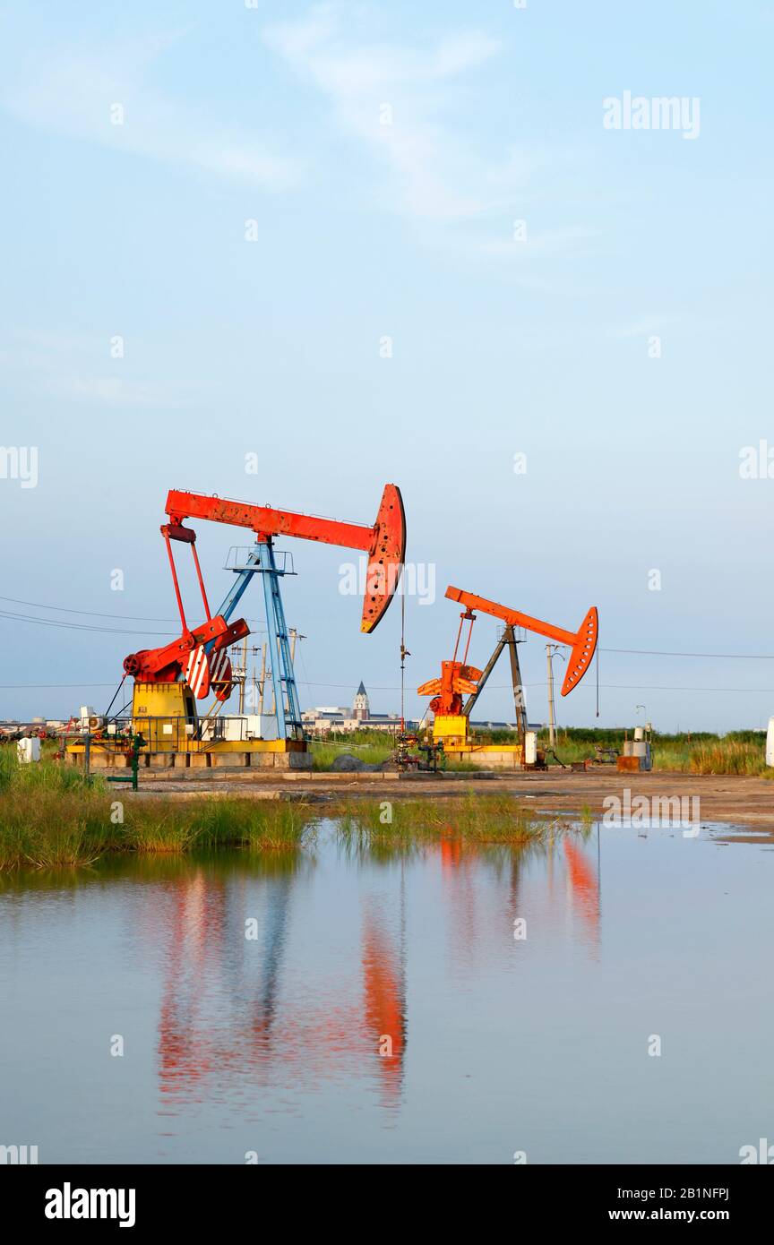 Oil field, oil pump in the work Stock Photo - Alamy