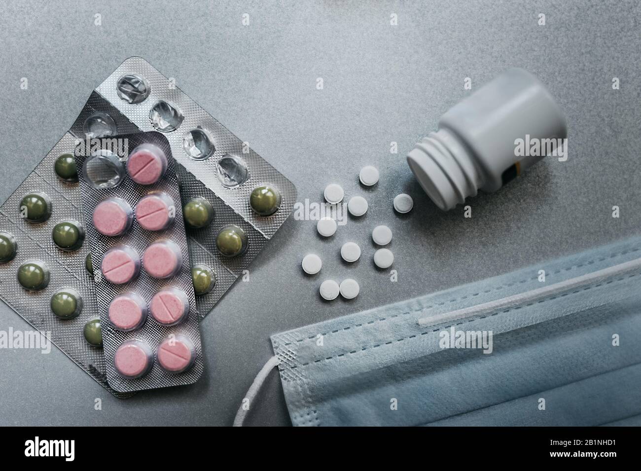 a set of medical items ready-made layout, white tablets poured out of ...