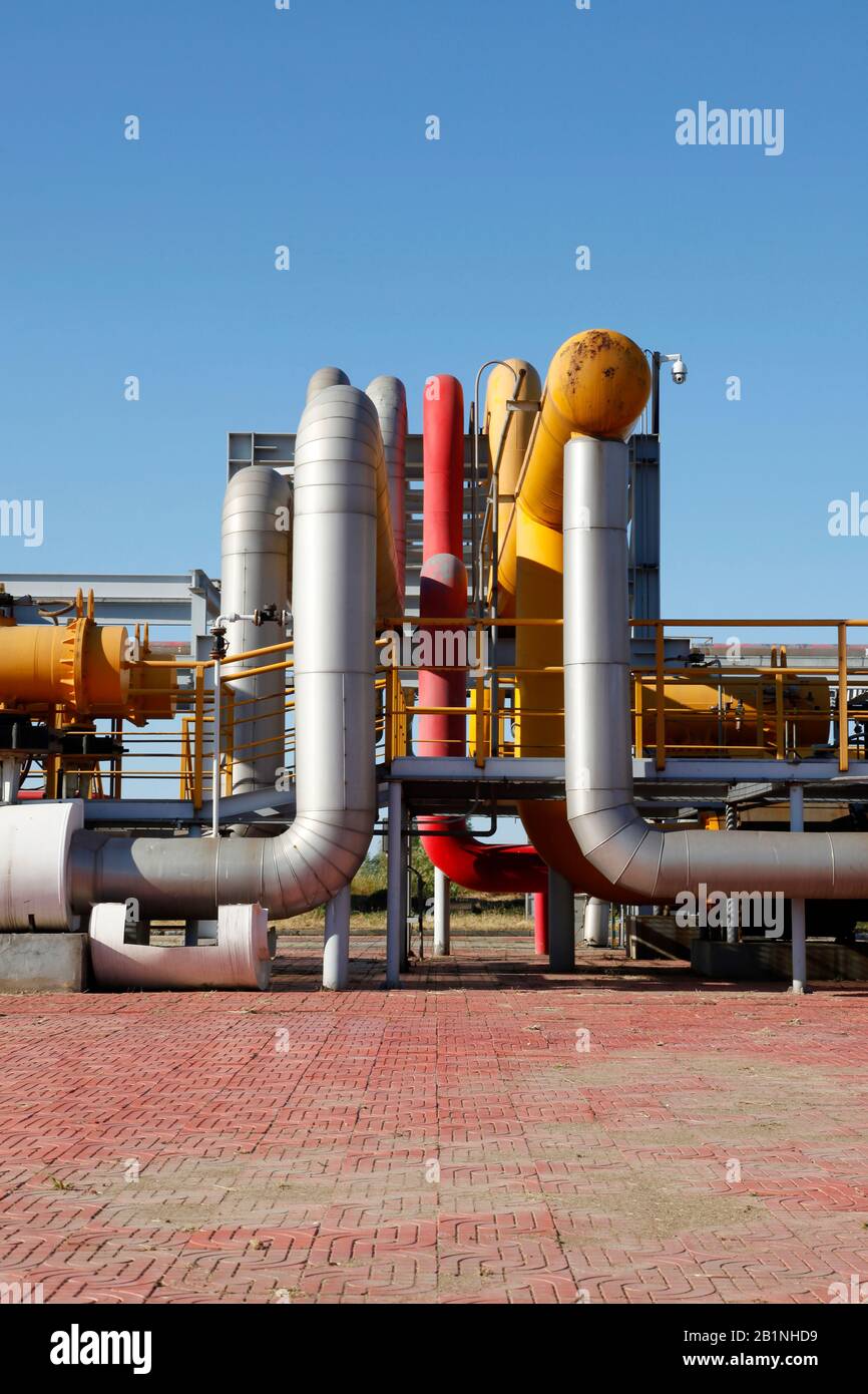 Oil field scene, oil pipelines and facilities Stock Photo - Alamy