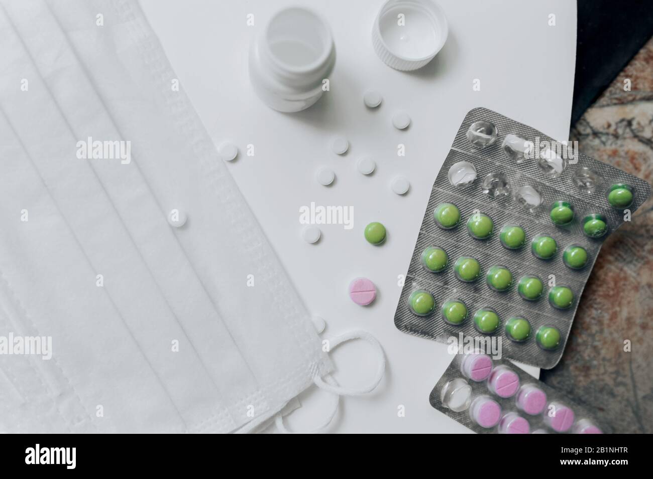 a set of medical items ready-made layout, white tablets poured out of ...