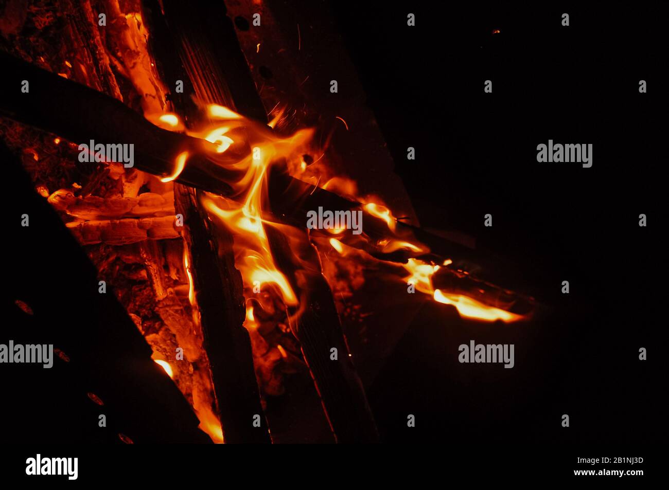 close-up abstract, orange and yellow flames from a fire, a burning tree ...