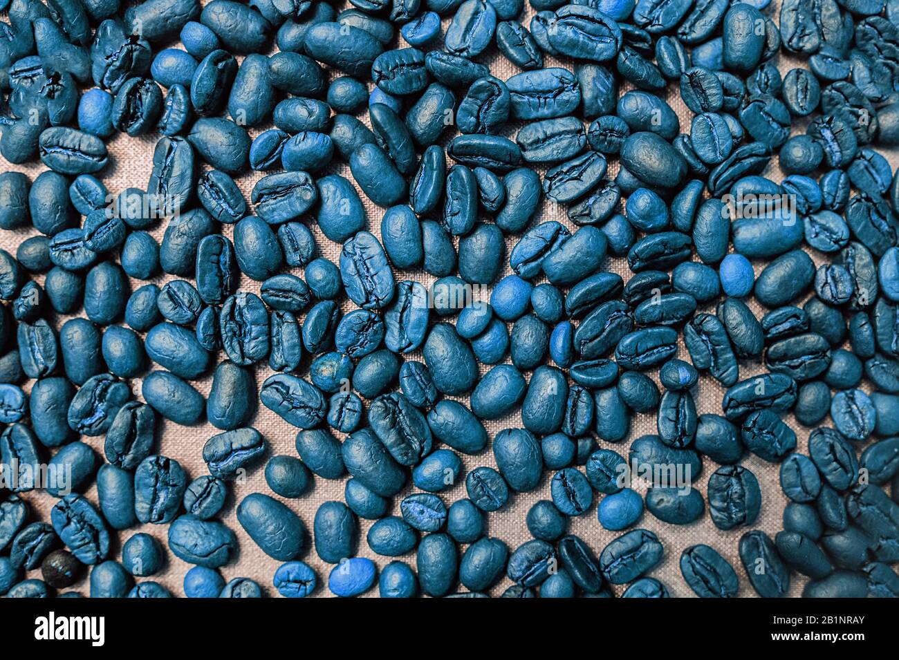 beautiful roasted classic blue coffee beans on the whole image on a ...