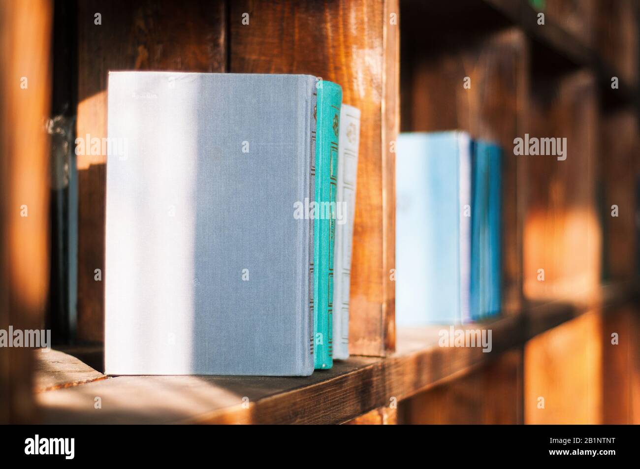 blue and turquoise books without a picture and without a cover close-up ...