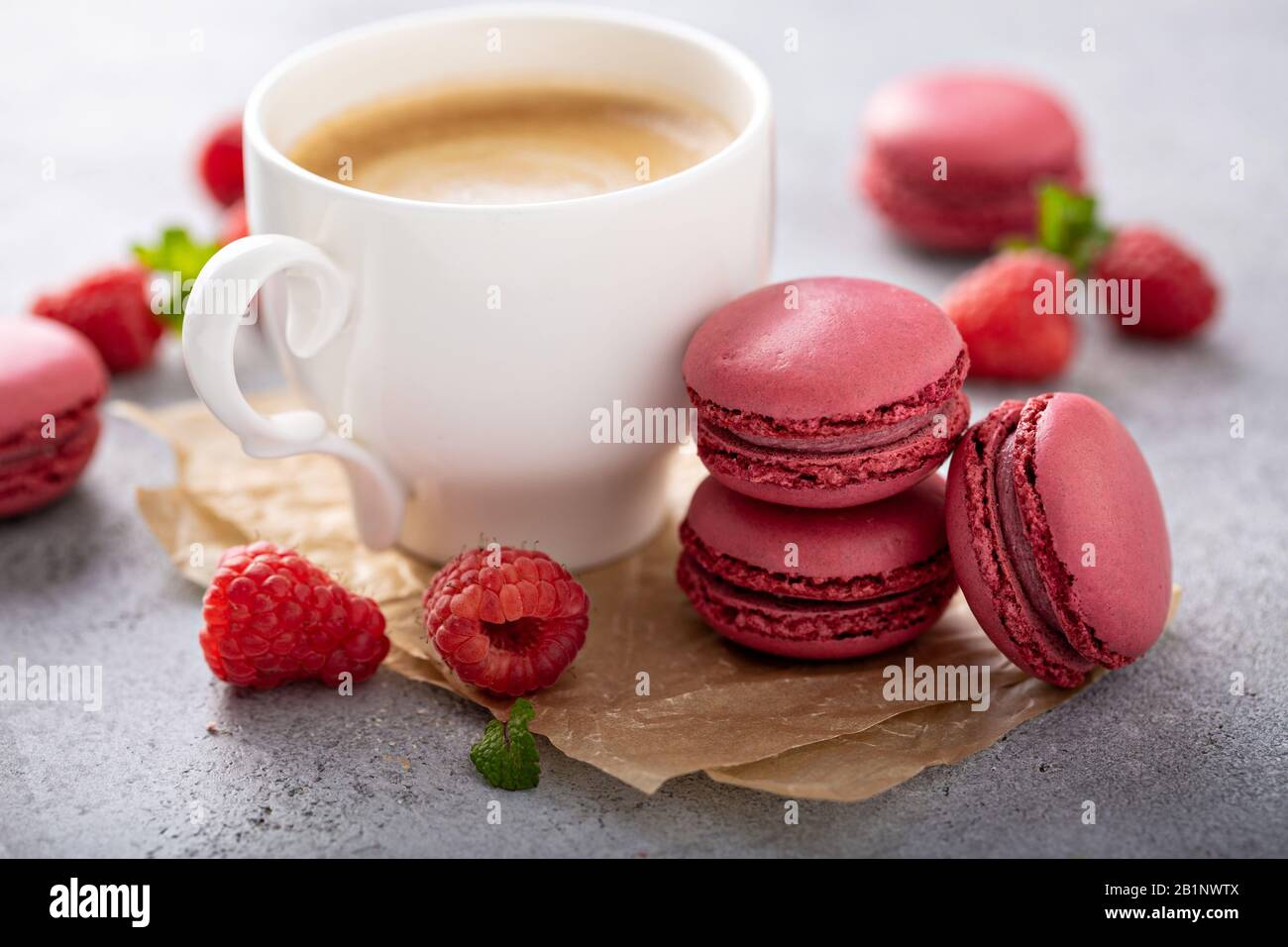 Raspberry macarons with fresh berries Stock Photo - Alamy