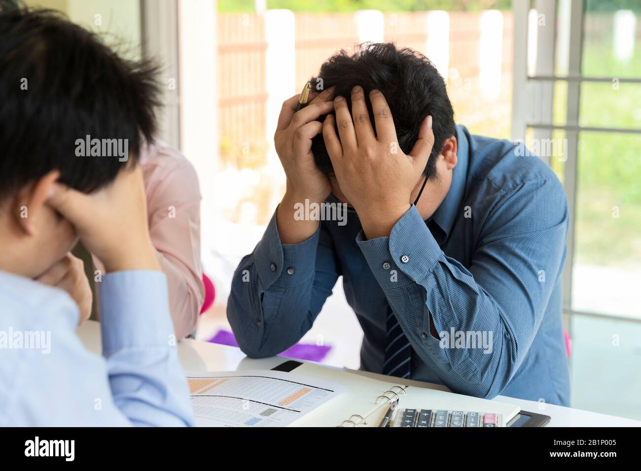 Businessmen in stress, tired, sad, disappointed with project problem ...