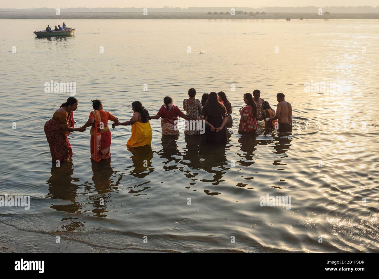 People bathing in water holy Ganga river in morning. Varanasi. India ...