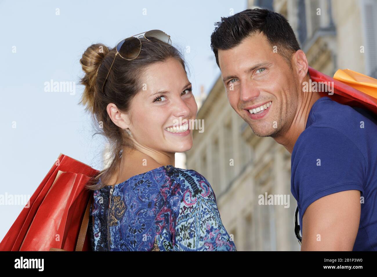 Couple looking back over shoulder hi-res stock photography and images ...
