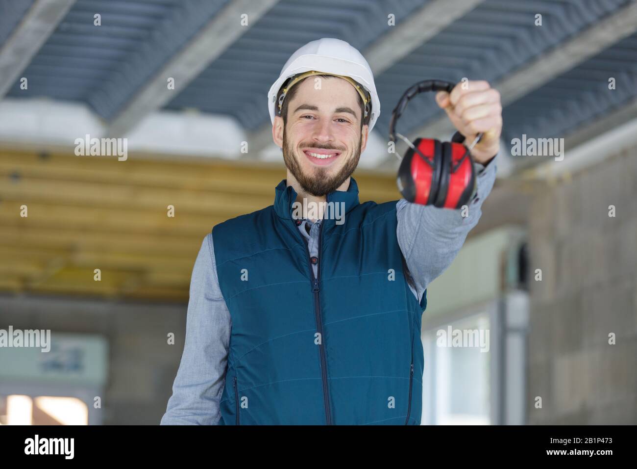 worker showing ar protection Stock Photo - Alamy
