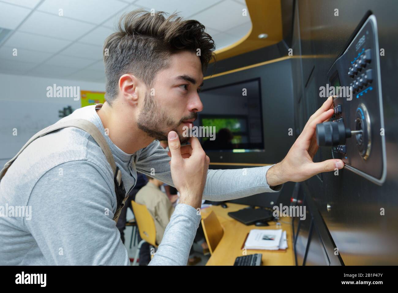 a security man is looking Stock Photo - Alamy