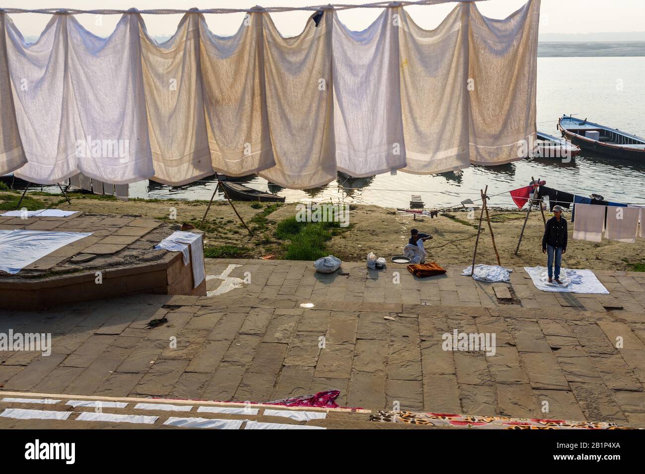 Indian woman washing clothes hi-res stock photography and images - Alamy