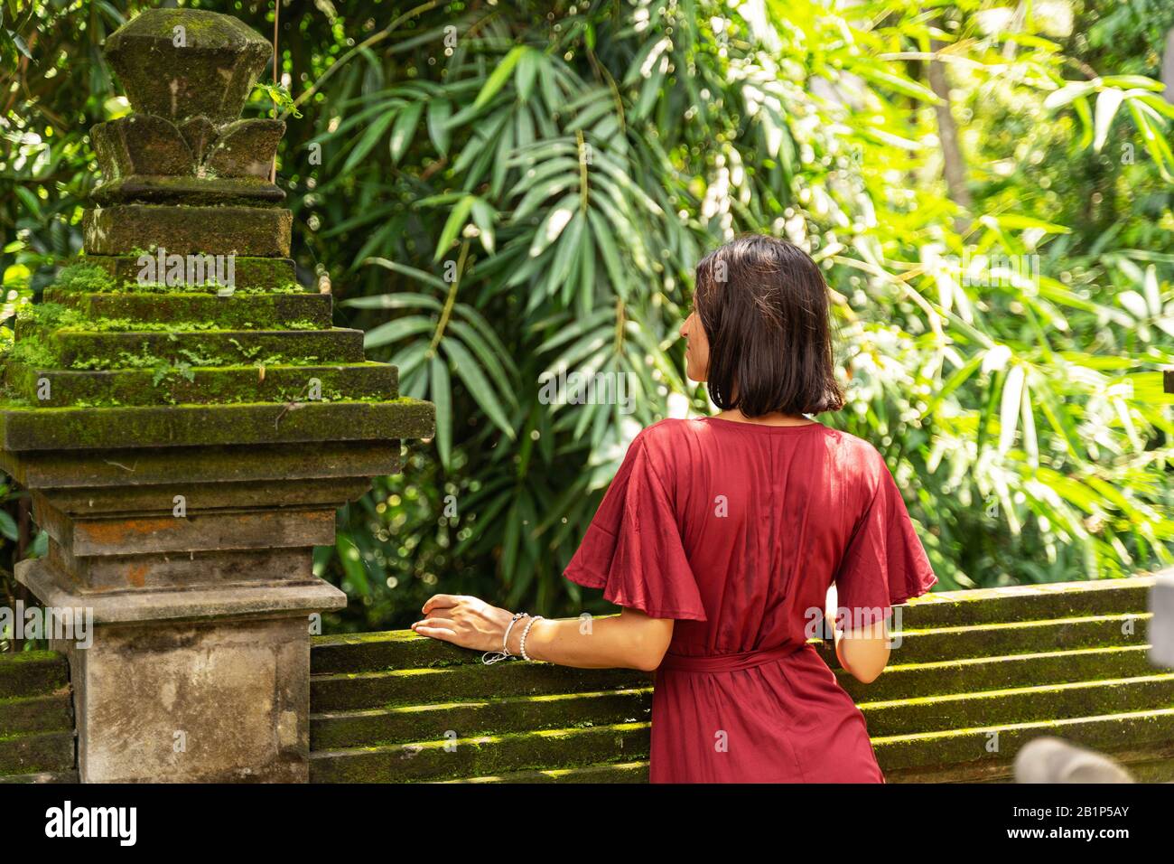 Cute international girl having pause during walk Stock Photo - Alamy
