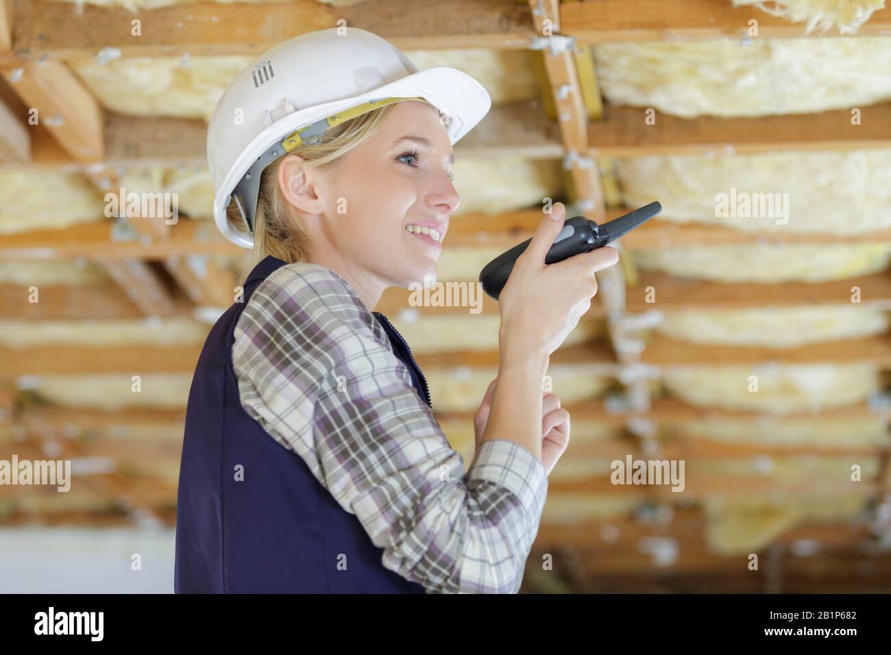 Woman using two way radio hi-res stock photography and images - Alamy