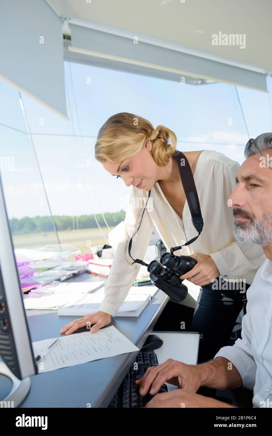 control tower workers in airport Stock Photo - Alamy