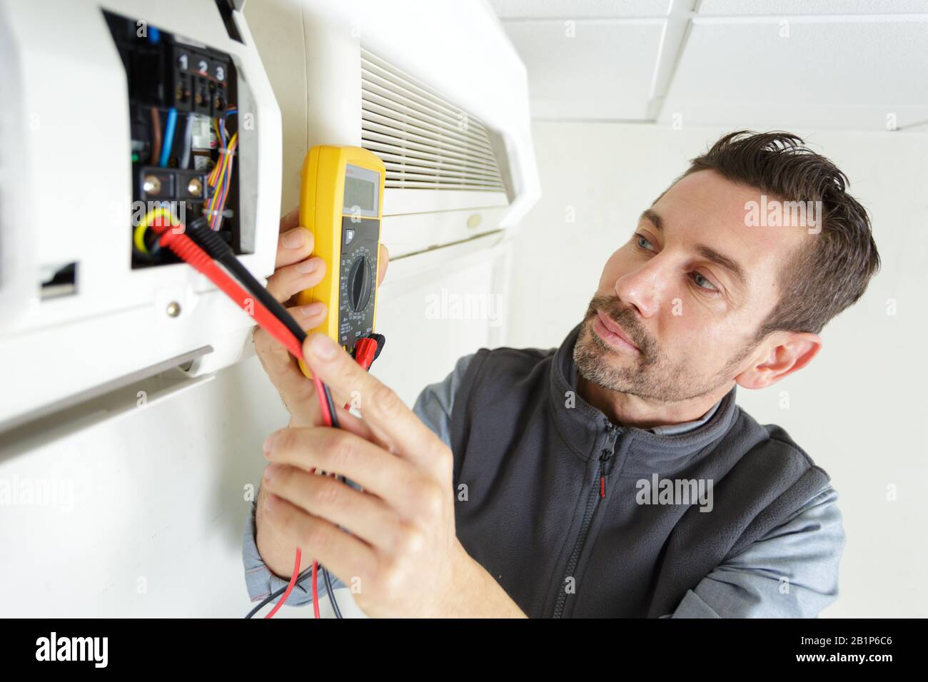 Electrician fixing electrical panel hi-res stock photography and images ...