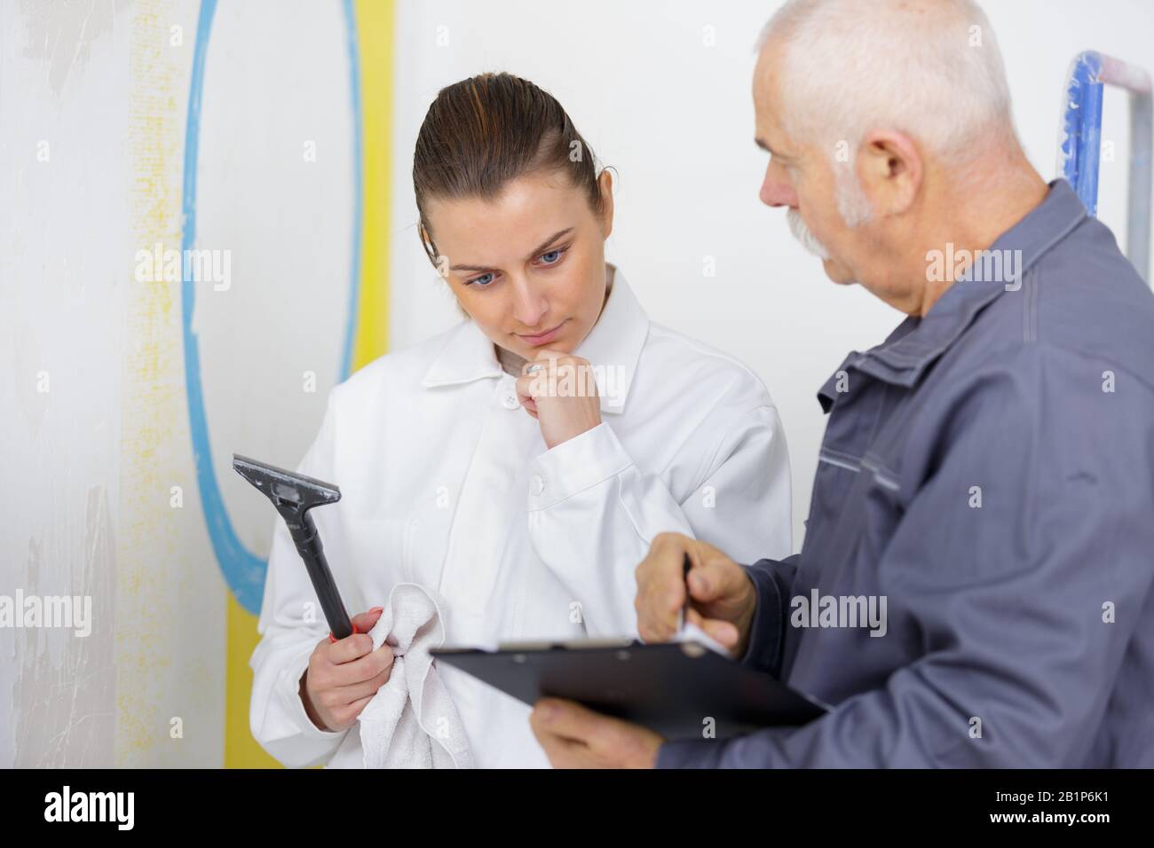 Holding scraper hi-res stock photography and images - Alamy