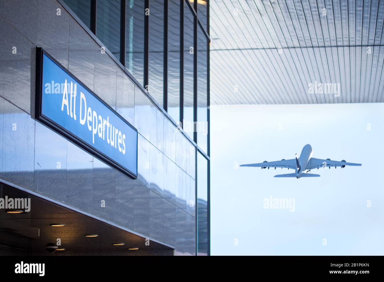 airport departure sign building with plane in background Stock Photo ...