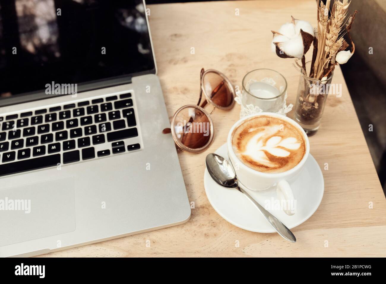 Laptop and coffee cup on wood table hi-res stock photography and images ...
