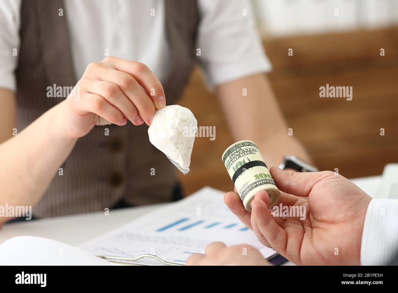 Exchanging a handshake hi-res stock photography and images - Alamy