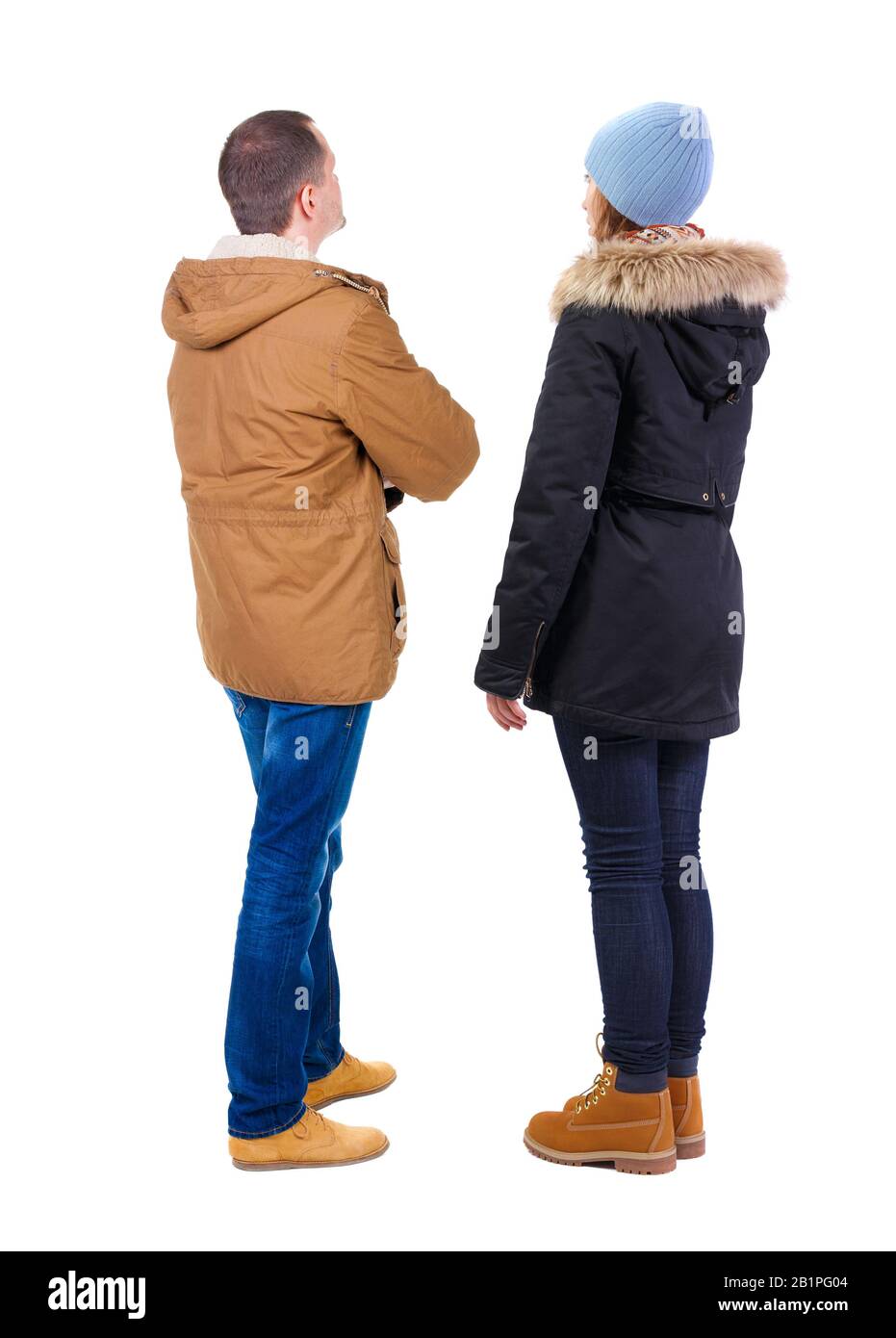 Back view of couple in winter jacket. beautiful friendly girl and guy ...