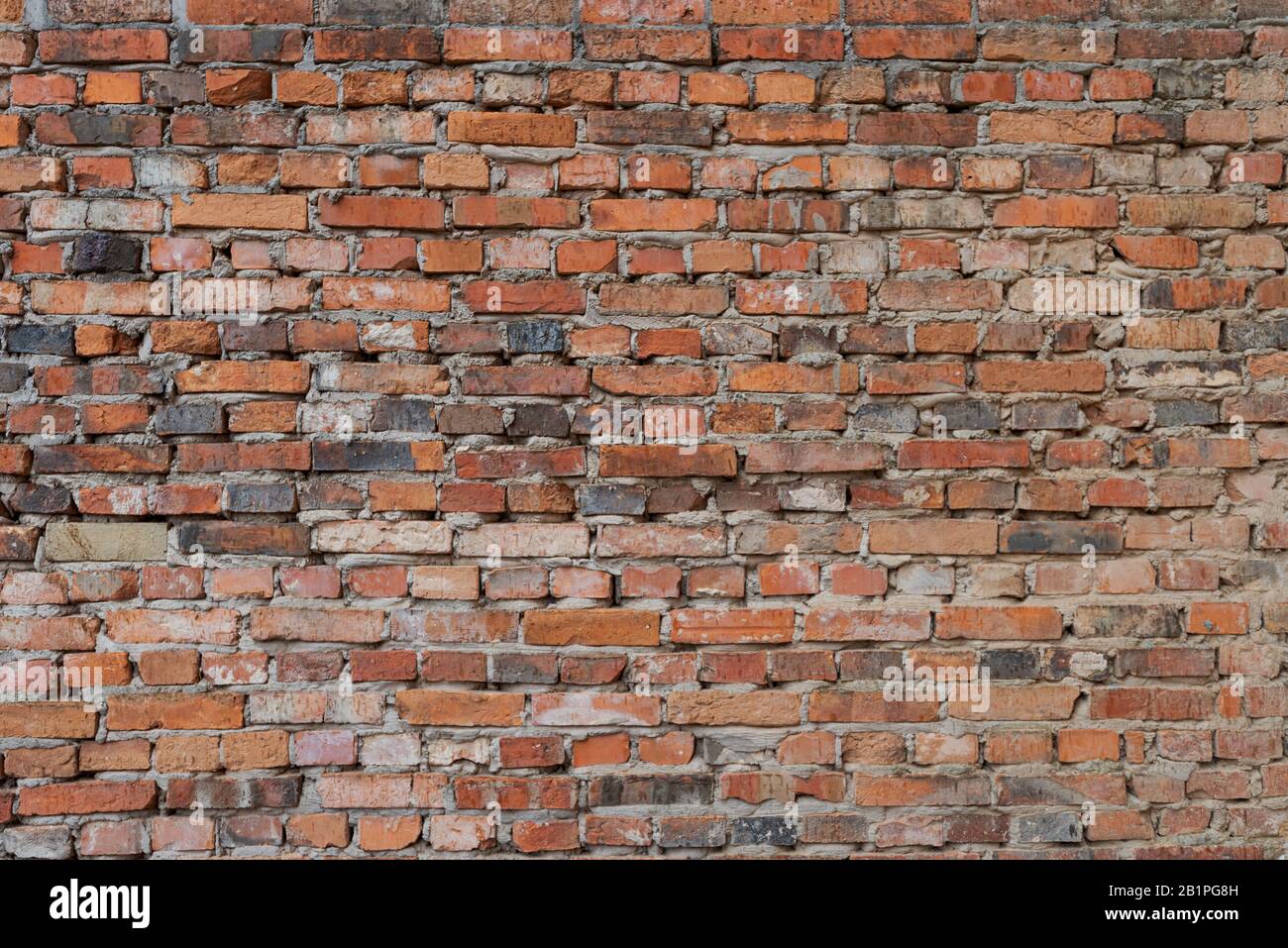 Detail of withered red brick wall Stock Photo - Alamy
