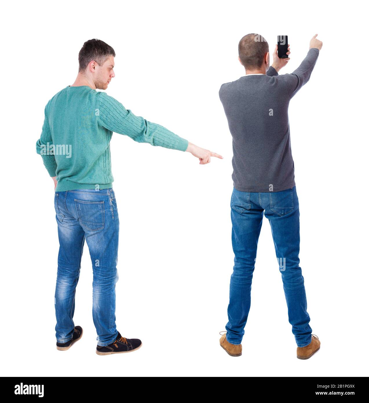 Back view of two man in sweater with mobile phone. Rear view people ...