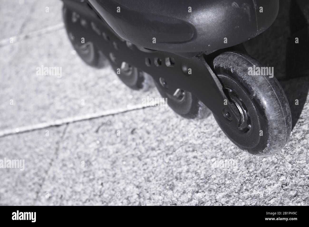 Black freestyle roller skates Stock Photo - Alamy