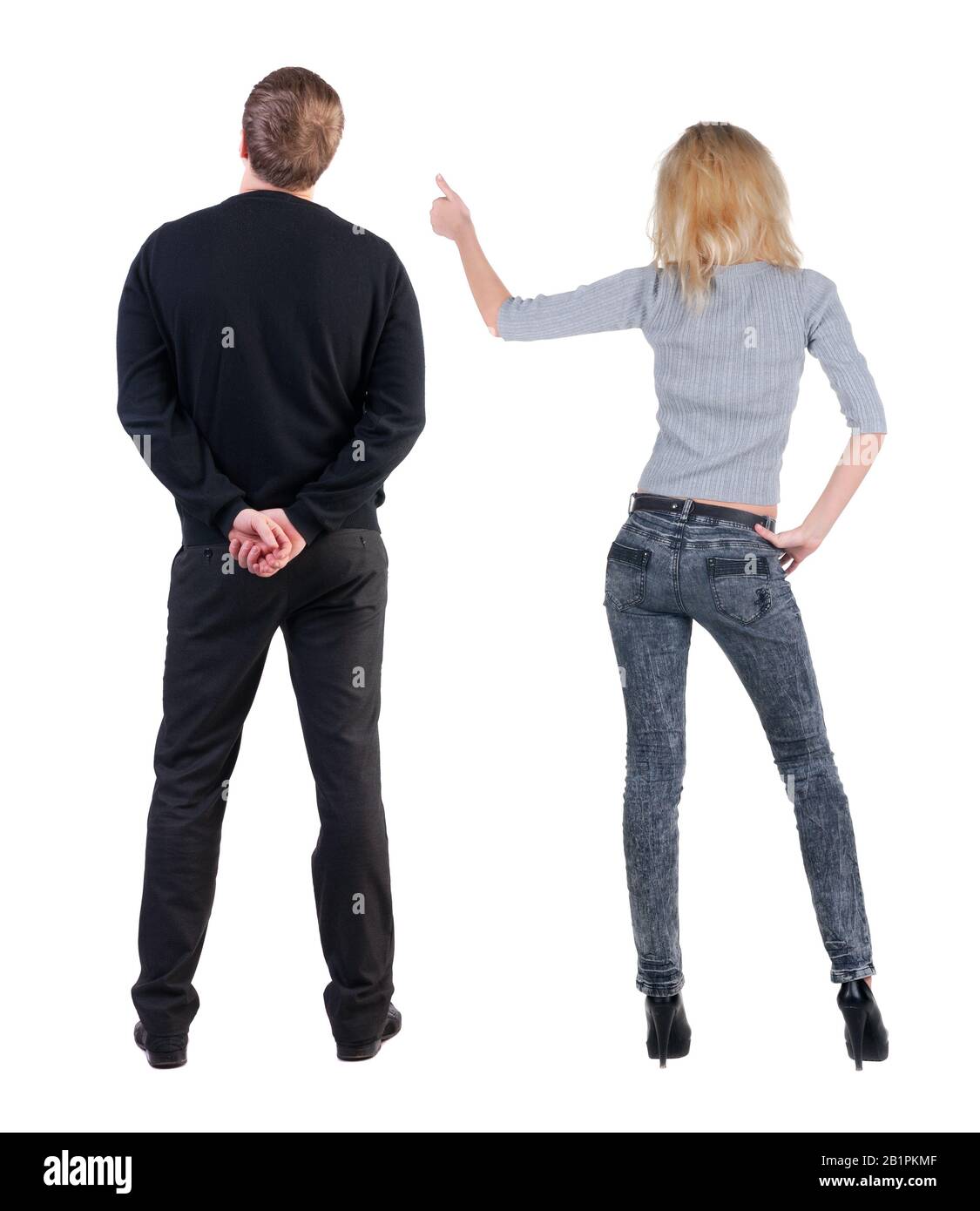 Back view of couple in sweater showing thumbs up. beautiful woman and ...