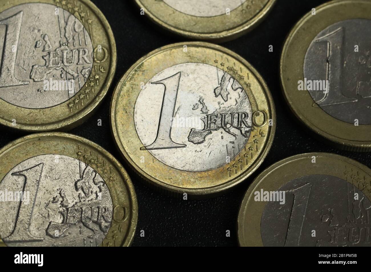 Multiple One Euro tails side coins macro money Europe close up Stock ...