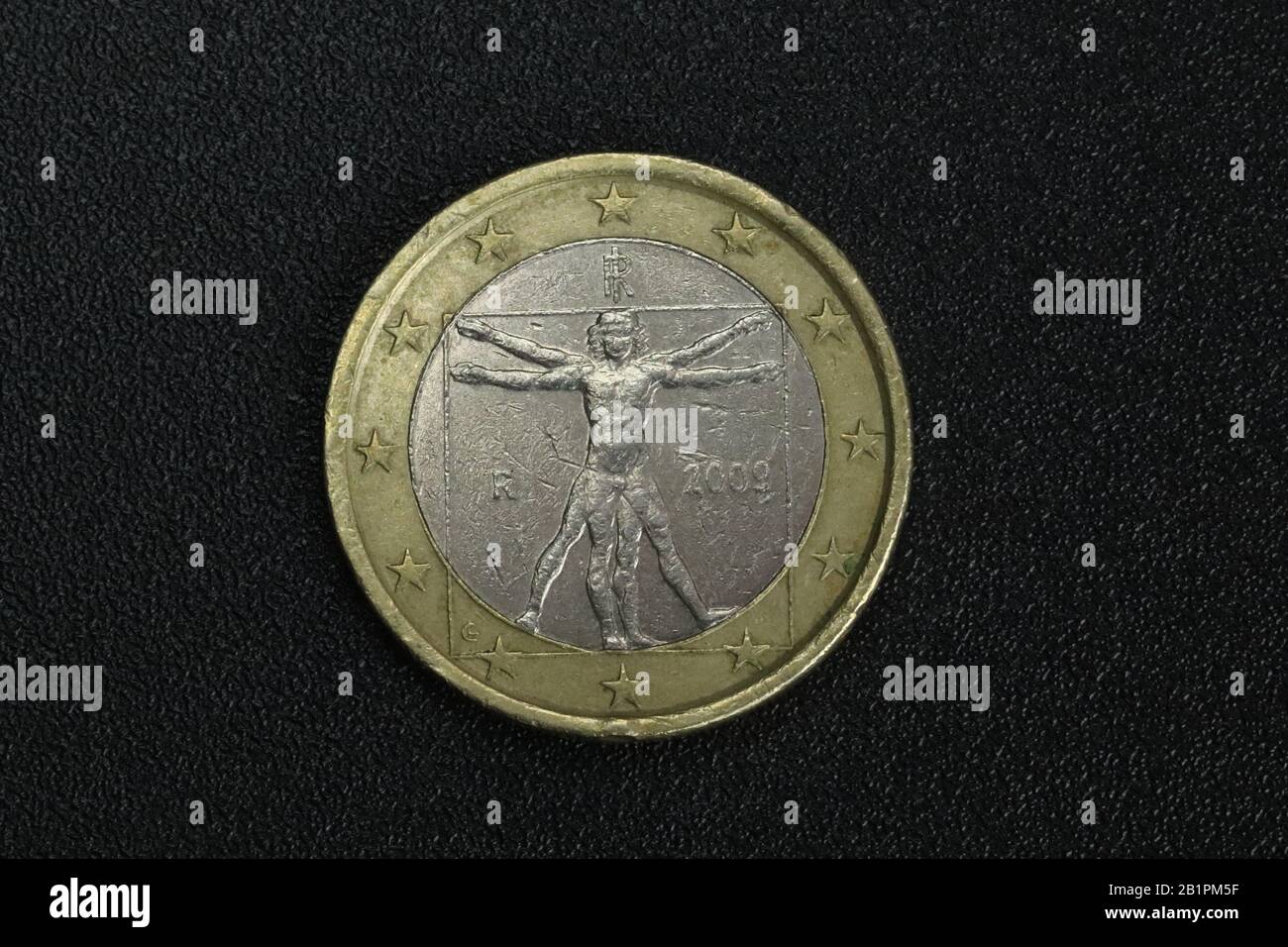 One Euro heads side coins macro money Europe close up Vitruvian Man Da ...
