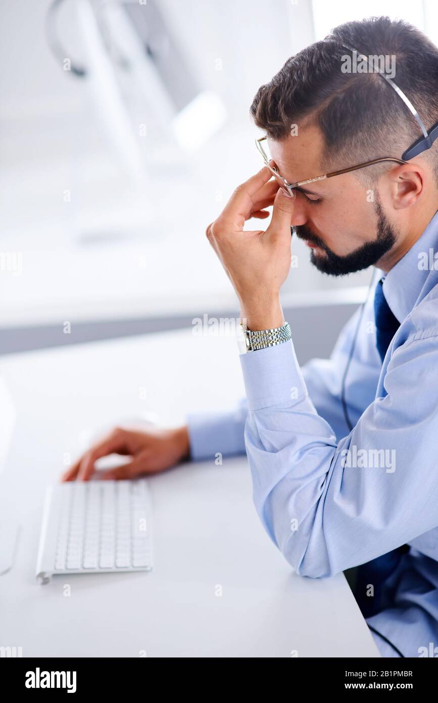 Tired receptionist hi-res stock photography and images - Alamy