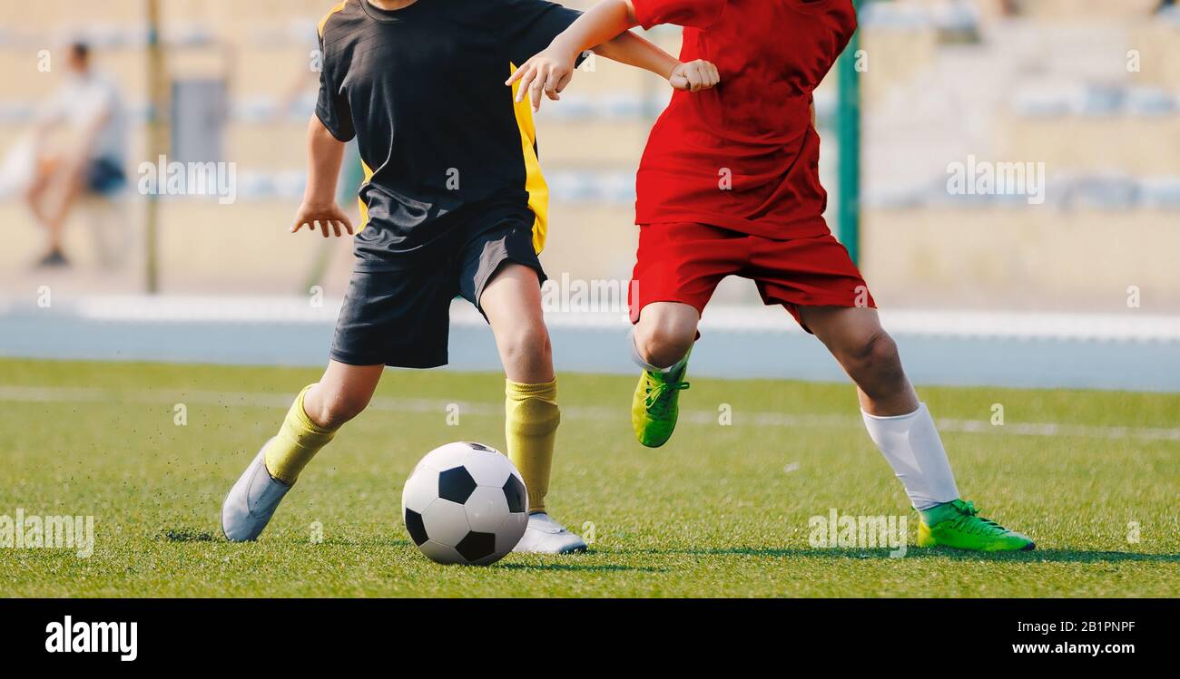 Soccer Players Running After Ball. Soccer Game in Action. Footballers ...