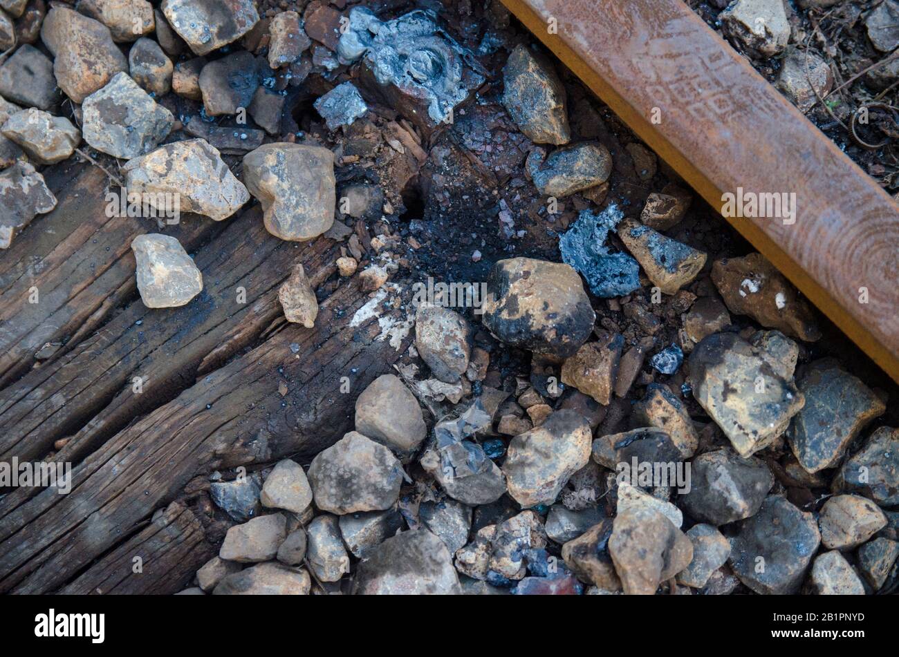 Worn Stones on Train Track Stock Photo - Alamy