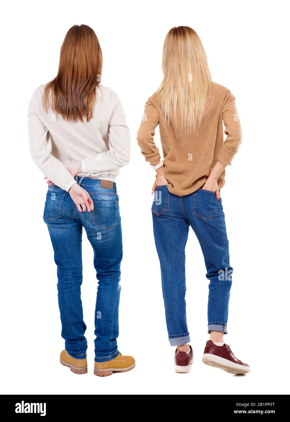 Back view of two woman in sweater. Rear view people collection ...