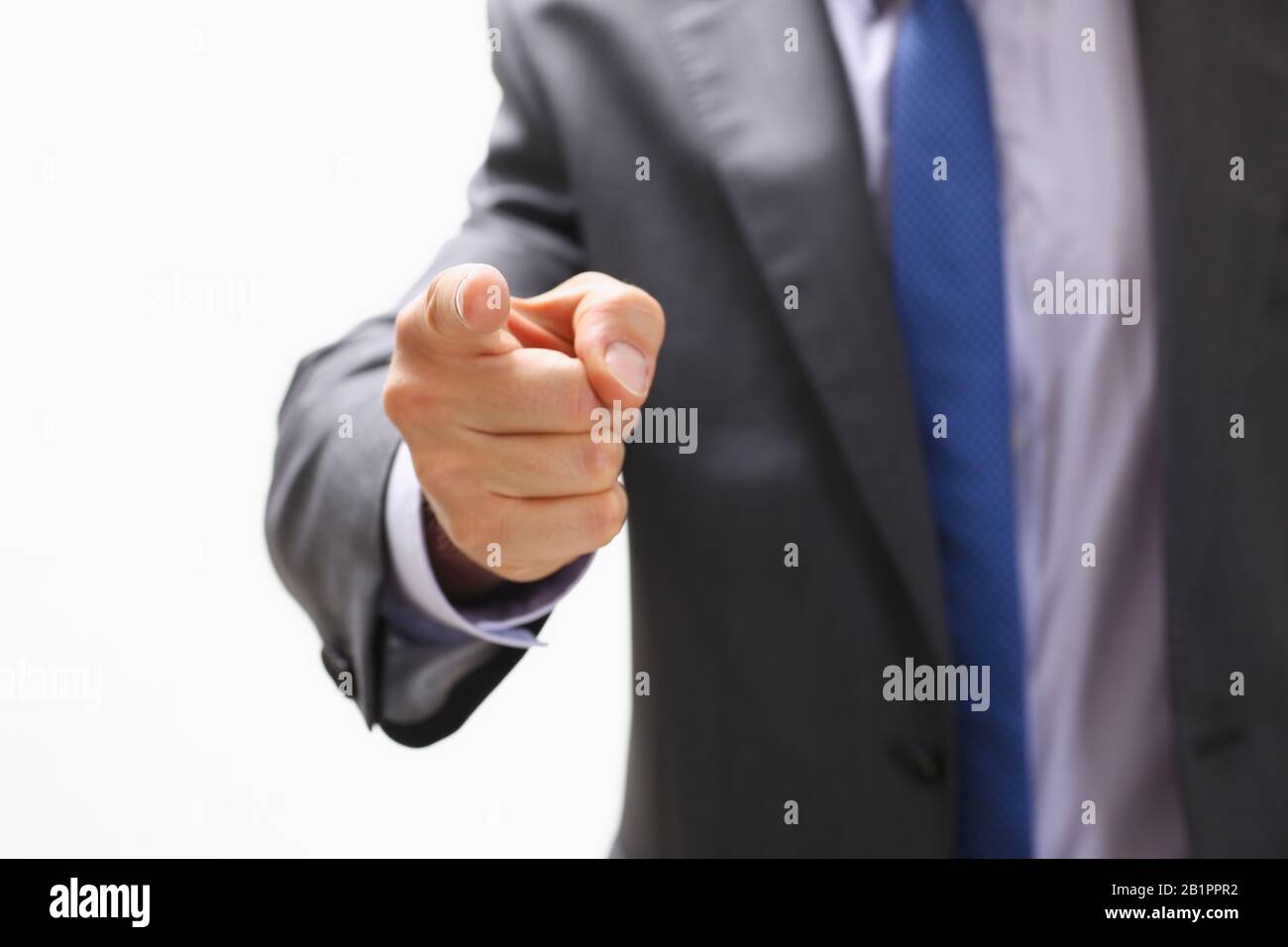 Businessman points a finger at someone who watches a photo Stock Photo ...