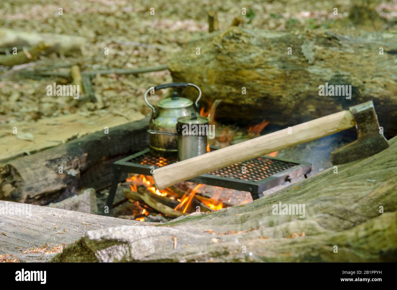 Cooking Tea in Camping Stock Photo - Alamy