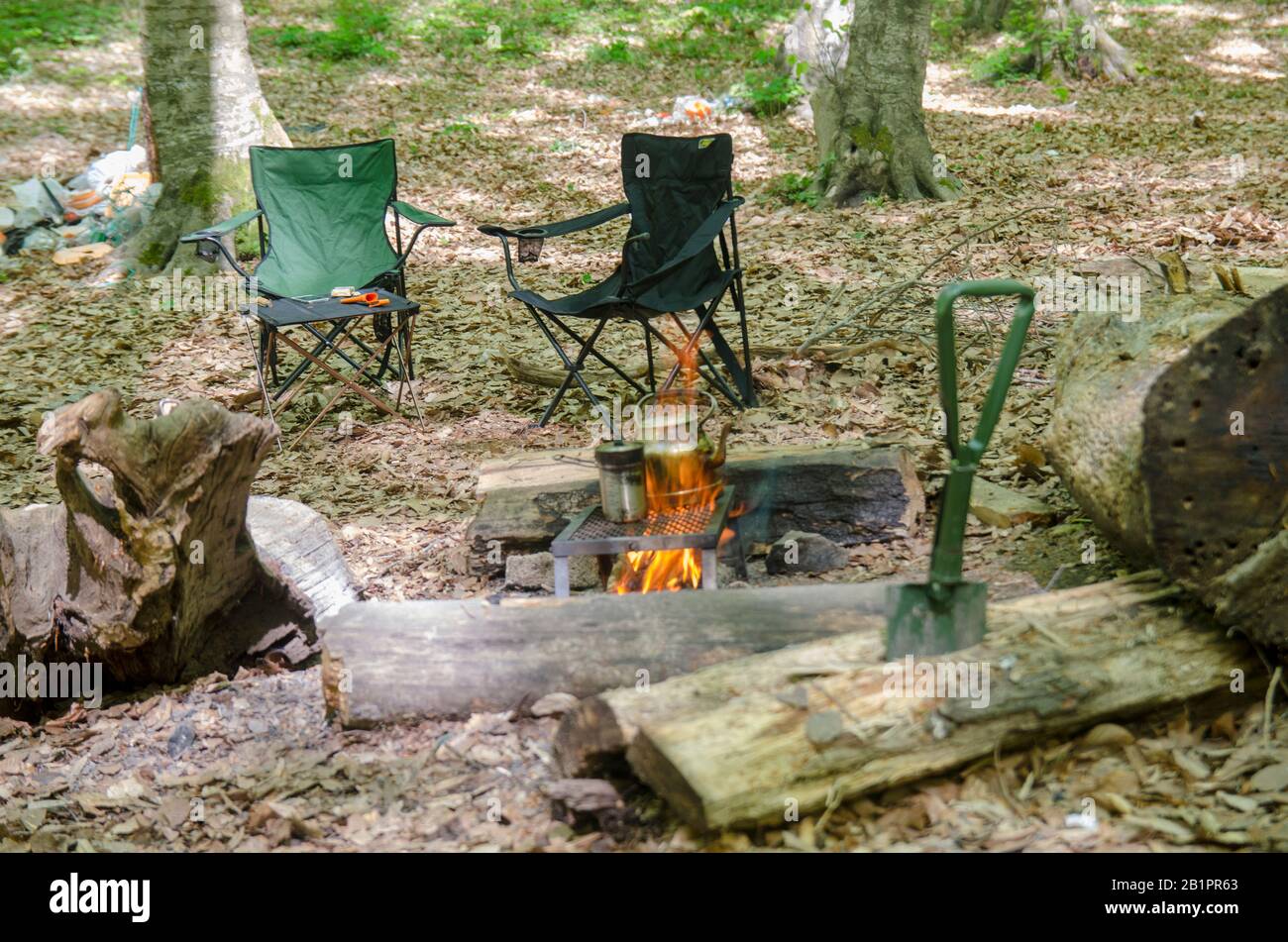Cooking Tea in Camping Stock Photo - Alamy