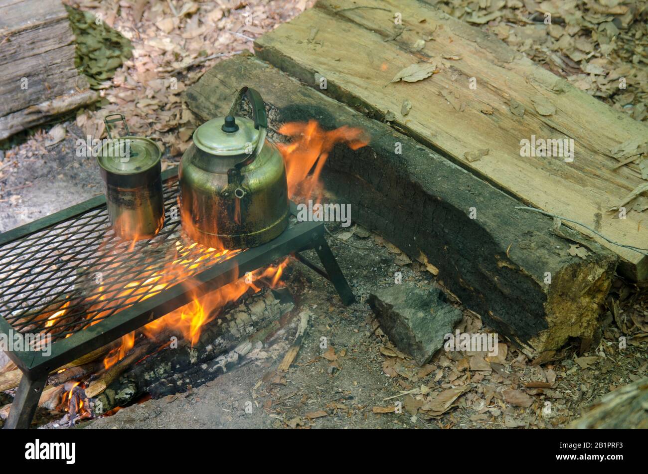 Cooking Tea in Camping Stock Photo - Alamy