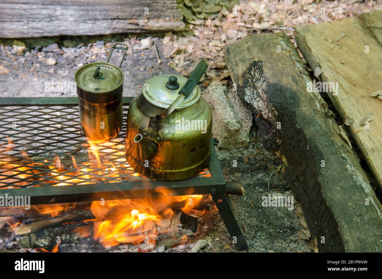 Cooking Tea in Camping Stock Photo - Alamy