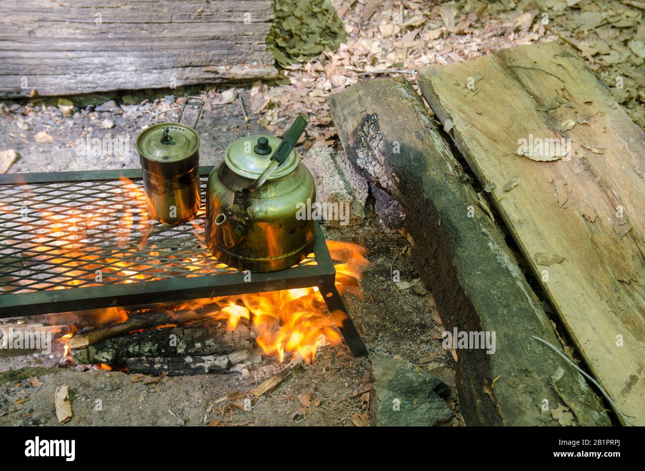 Cooking Tea in Camping Stock Photo - Alamy