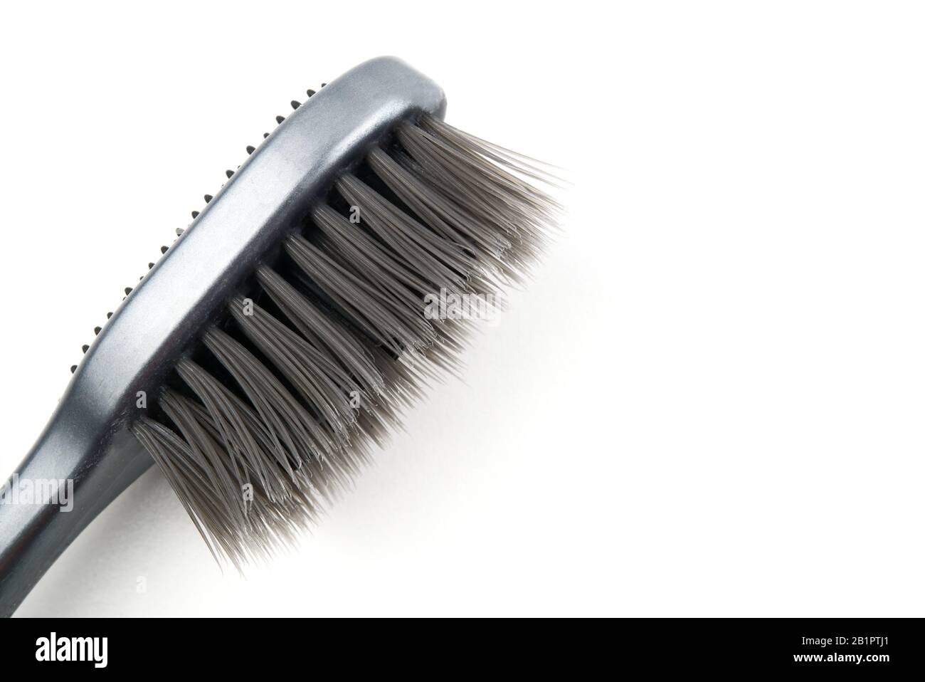 black toothbrush close up isolated over white background Stock Photo ...