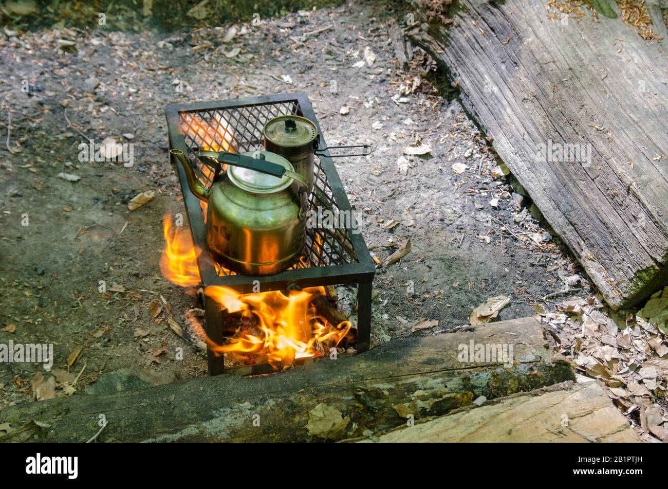 Cooking Tea in Camping Stock Photo - Alamy